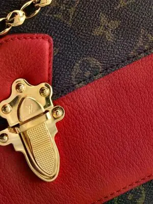 LOUIS VUITTON Victoire Handbag Monogram Canvas And Leather - Brown
