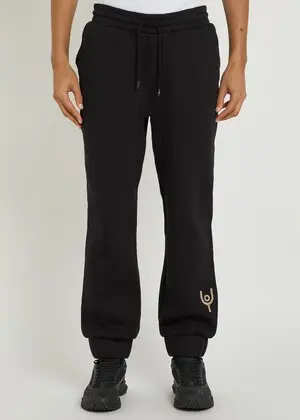 NOW YOU LIVE Magna Logo-embroidered Cotton-blend Sweatpants - Black