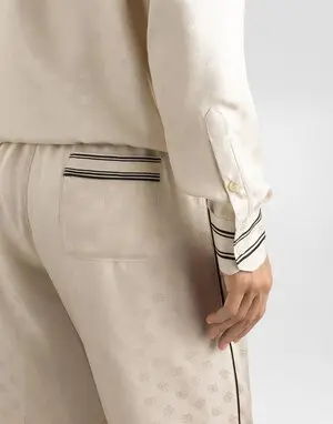 Dolce & Gabbana Logo And Stripe-print Twill Trousers - Multicolor