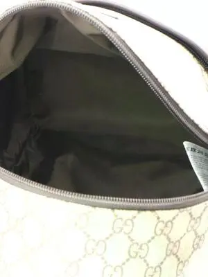Gucci Front Pocket Gg Coated Canvas Small Backpack - Brown