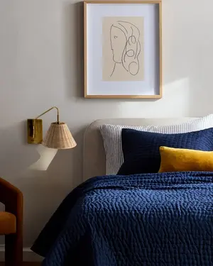 Quince Articulating Sconce With Rattan Shade