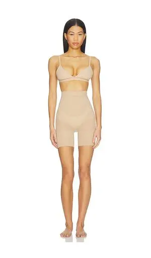 SKIMS Sheer Seamless Mid Thigh Short In Tan - Clay