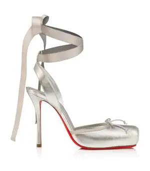 Christian Louboutin Lace Up Pumps