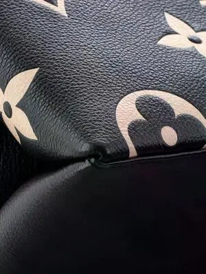LOUIS VUITTON Petit Palais Handbag Bicolor Monogram Empreinte Giant - Black