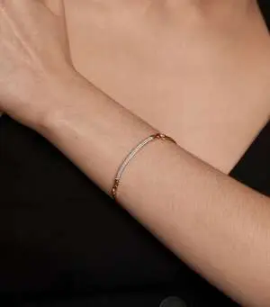 ASTRID & MIYU Plated Knot Bangle - Gold
