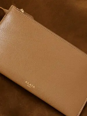 Alaïa Large Logo-detailed Leather-trimmed Suede Bucket Bag - Green