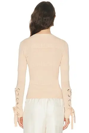 AKNVAS Ribbed Striped Knit Top With Lace-up Cuffs
