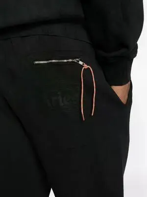 Aries Faded Temple Track Pants