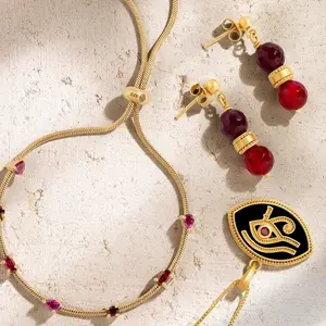 KARMA AND LUCK Garnet Gold-plated Bolo Bracelet