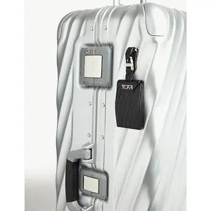 Tumi Aluminum Extended Trip Suitcase - Silver
