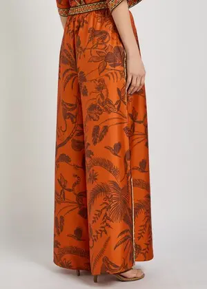 ALEMAIS Alémais Monkey Dance Printed Wide-leg Silk Trousers - Rust
