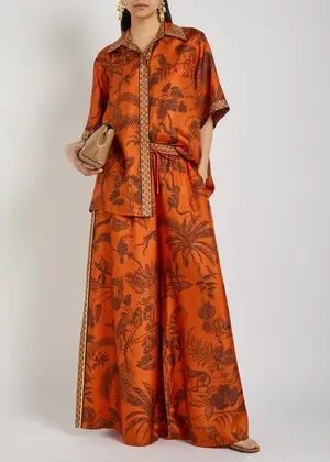ALEMAIS Alémais Monkey Dance Printed Wide-leg Silk Trousers - Rust