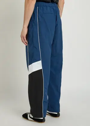 NAHMIAS Warm Up Panelled Shell Track Pants - Blue