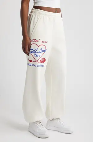 THE MAYFAIR GROUP Self Love Club Oversize Fleece Graphic Sweatpants