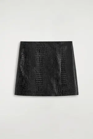 Croc-effect leather wrap skirts
