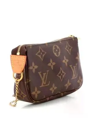 LOUIS VUITTON Pochette Accessoires Monogram Canvas Mini Clutch