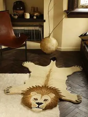 DOING GOODS Lion Motif Artisan Rug