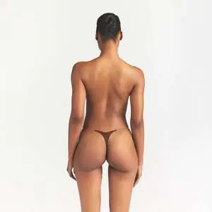 SKIMS Clear Strap String Thong | Deep Neutral | Large | Invisible - Cocoa