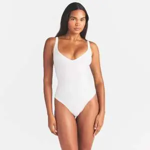 SKIMS SKIMS Unlined Plunge Thong Bodysuit Ivory