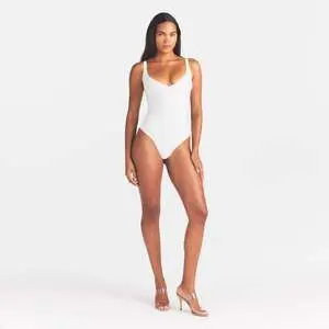 SKIMS SKIMS Unlined Plunge Thong Bodysuit Ivory