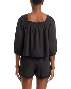 The Great. The Eyelet Button Sleep Top - Black