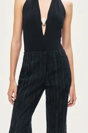 NOCTURNE Textured Relaxed-fit Pants