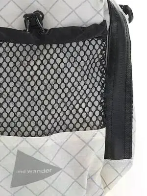 AND WANDER Mesh Pocket Shoulder Bag - White