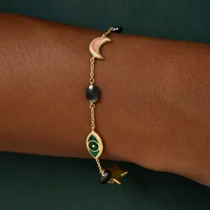 KARMA AND LUCK Multi Symbol Gold Plated Charm Bracelet