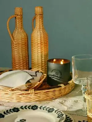 HOUSE OF CAPRICORN Wicker Handle Bottle
