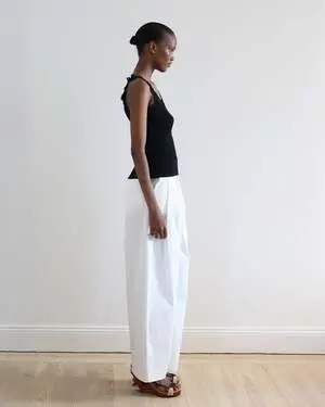 LEONÍ Lma Lace-trimmed Ribbed Silk Top