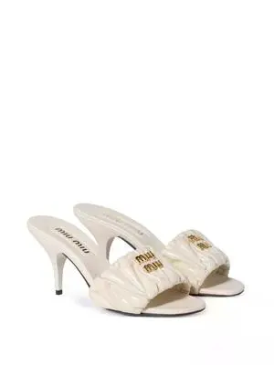 Miu Miu Matelassé Patent Nappa Leather Mules - Neutrals