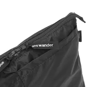 AND WANDER Sil Sacoche