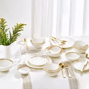 Prouna Gem Cut Gold Tea Cup & Saucer - White