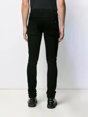 Amiri Broken Skinny Jeans - Black