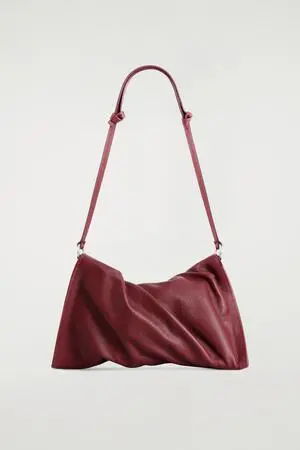 Cos Twisted Mini Clutch Bag