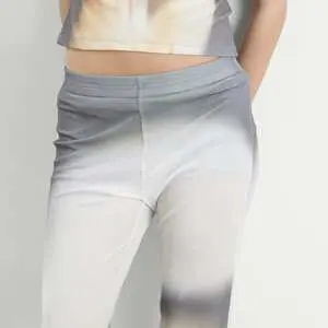 KIJUN Sheer Print Flared Trousers