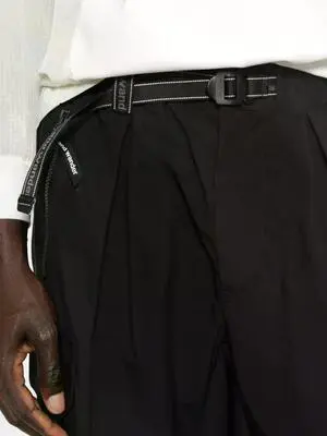 AND WANDER Zip Pocket Trousers