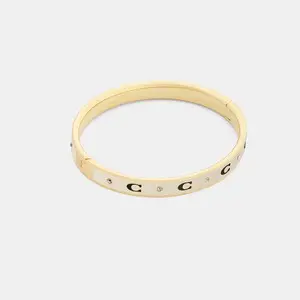 COACH Repeated C Hinged Bangle Bracelet - Gold/chalk