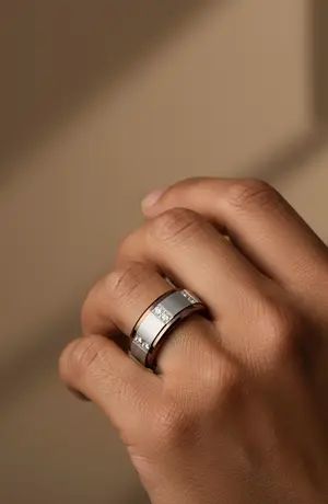 LARSON JEWELERS Beowulf Raised Center Tungsten Wedding Band