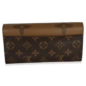 LOUIS VUITTON Reverse Monogram Giant Canvas Sarah Wallet - Brown