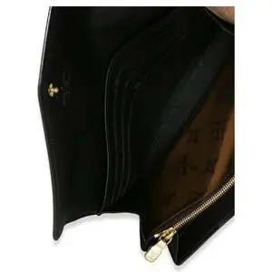 LOUIS VUITTON Reverse Monogram Giant Canvas Sarah Wallet - Brown