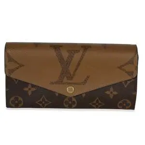 LOUIS VUITTON Reverse Monogram Giant Canvas Sarah Wallet - Brown