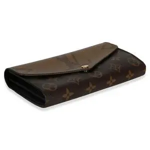LOUIS VUITTON Reverse Monogram Giant Canvas Sarah Wallet - Brown