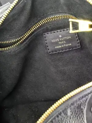LOUIS VUITTON Petite Malle Souple Monogram Empreinte Leather - Black