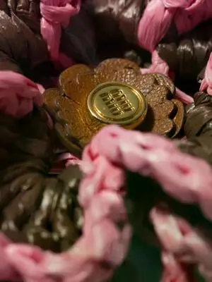 Miu Miu Leather And Raffia-effect Yarn Floral Charm With Logo Detail