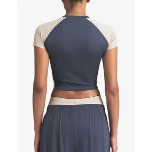 NIKESKIMS Matte Shine Cropped Baby Tee Training Top
