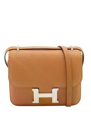 Hermes Gold Tone Cross Body Bags
