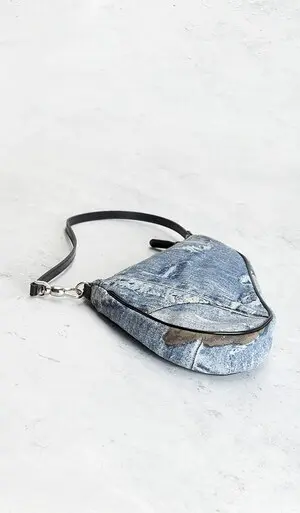 Undefined Dior Denim Saddle Bag