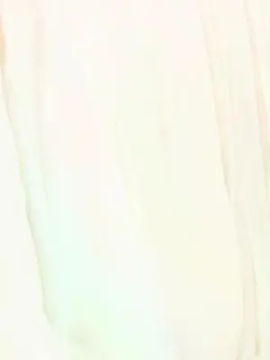 NISSA Asymmetrical Chiffon Blouse With Tassel Detail