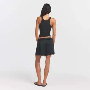 SKIMS Lace Boxer | Black | | Woven Shine